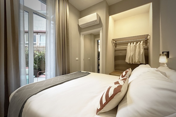 Apartamento Superior | Cofre no quarto, secretária, ferro/tábua de engomar, Wi-fi grátis