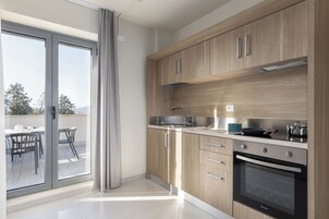 Apartamento real | Cozinha privada | Fogão, cooktop, chaleira elétrica