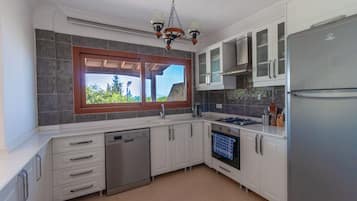 Villa, vista para o mar | Cozinha privada