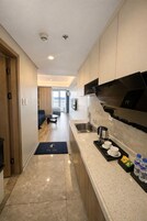 Apartamento conforto, 1 cama King, vista para a cidade | Roupas de cama premium, edredons de pluma