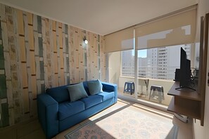 Apartamento | Sala de estar | Televisor de 40 polegadas com canais por cabo 