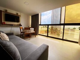 Apartamento Deluxe | Sala de estar