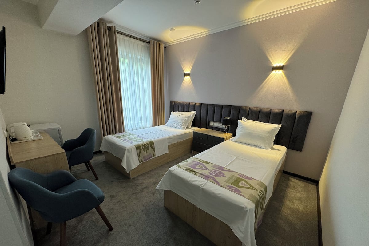 Quarto casal ou duplo luxo | Quartos à prova de som, ferros/tábuas de passar roupa, Wi-Fi de cortesia