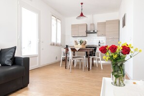 Condo superior | Área de estar | TV de tela plana