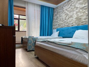 Quarto Triplo Standard | 1 quarto, quartos insonorizados, Wi-fi grátis