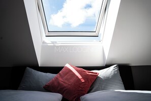 Apartamento | Cofre no quarto, quartos insonorizados, ferro/tábua de engomar