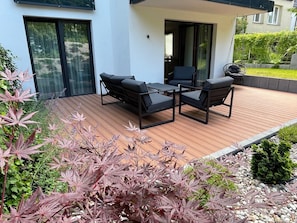 Apartamento premium, acessível, no jardim | Terraço/pátio
