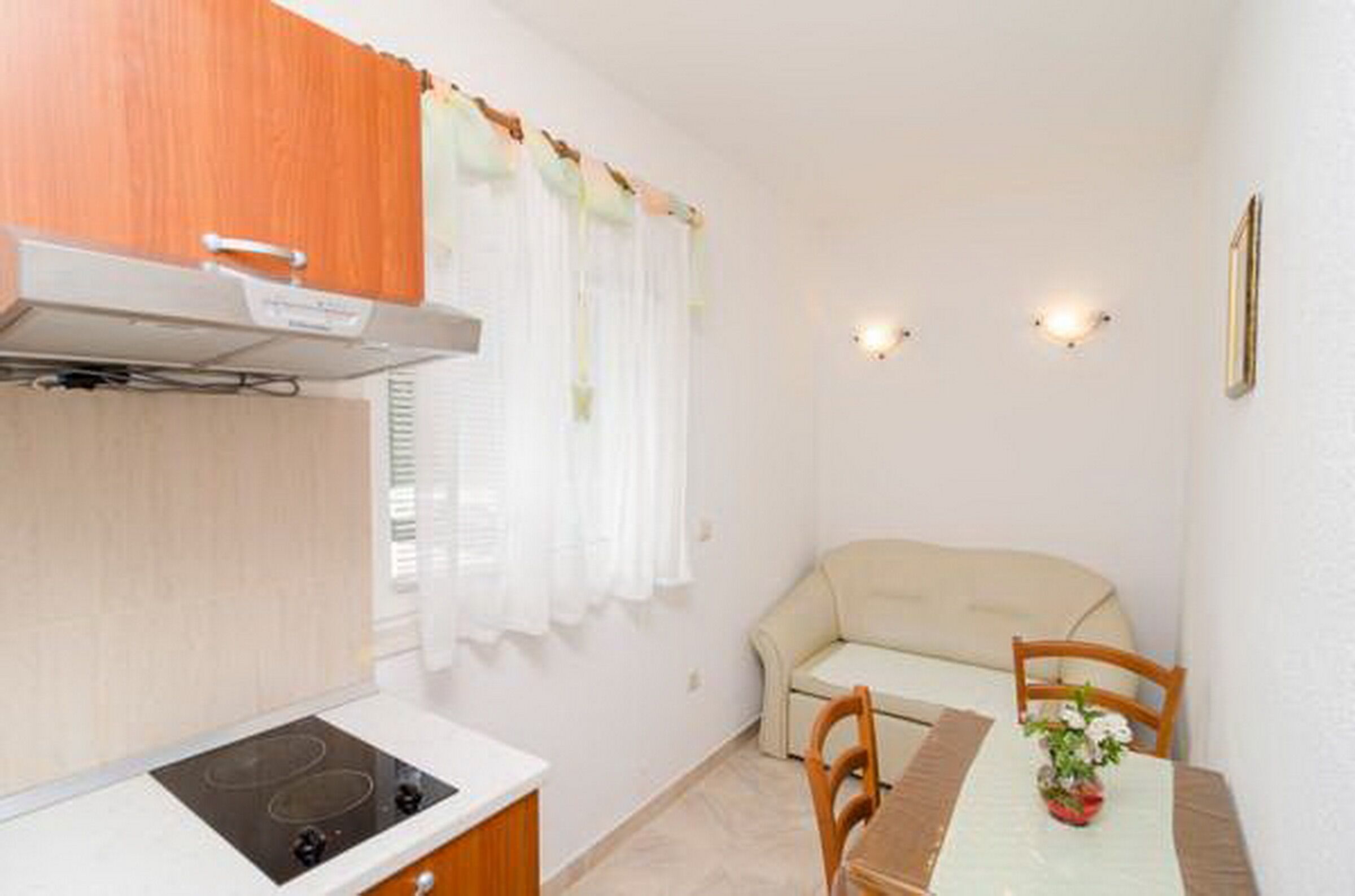 Apartamento (One Bedroom Apartment with Terrace ( ) | Sala | Televisor de ecrã plano de 32 polegadas com canais digitais 
