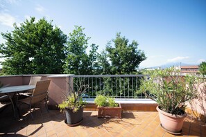 Apartamento conforto | Terraço/pátio