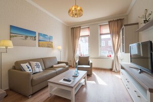 Suite Comfort, casa de banho privativa, vista para o pátio (Apartment Austernfischer) | Lounge