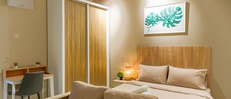 Estúdio conforto | Área de estar | TV de tela plana 42 polegadas com canais a cabo