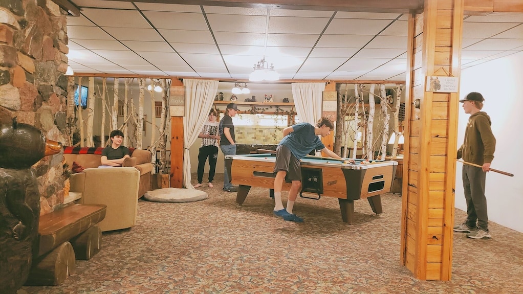 Private Couples Suite Inside The Lodge At North Ironwood Acres Resort With Knotty-pine Vaulted Ceiling, One King Bed, Sofa And One Small Bathroom. Dog Friendly!! - Michigan