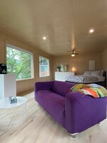 Cabana de Madeira Clássica, 1 cama queen-size, vista para o rio | Sala de estar