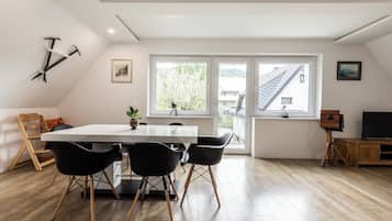 Apartamento luxo, vista para a montanha | Área de estar