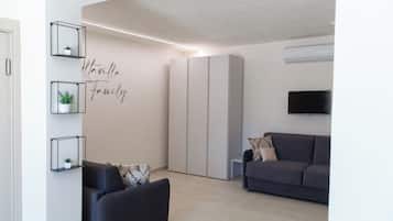Quarto Familiar | 1 quarto, minibar, cofre no quarto, quartos insonorizados