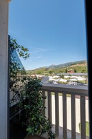 Quarto casal luxo, vista para a piscina | Terraço/pátio