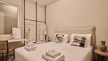 Suíte, 2 quartos | Frigobar, cofres nos quartos, escrivaninha