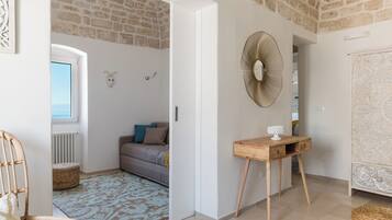 Apartamento, vista para o mar | Área de estar