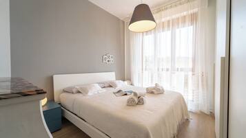 Apartamento, vista para o mar | 1 quarto, ferro/tábua de engomar, berços/camas para crianças