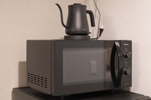 Quarto Quádruplo Standard, 2 camas queen-size, não fumadores (With Ramen) | Micro-ondas