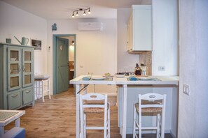 Apartamento | Sala de estar | Televisor de 35 polegadas com canais digitais 