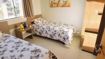 Apartamento família, sacada | Wi-Fi de cortesia, roupa de cama