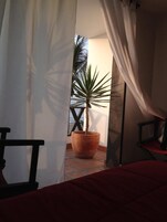 Suite Deluxe, vista para a praia | Terraço/pátio interior