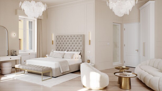 Um quarto moderno com uma cama grande, um sofá, uma mesa de centro e um candelabro.