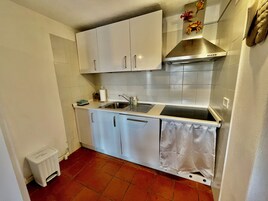Apartamento, varanda | Cozinha privada