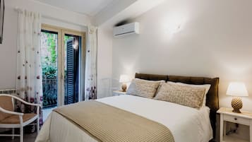 Apartamento, vista para o jardim | 2 quartos, ferro/tábua de engomar, Wi-fi grátis