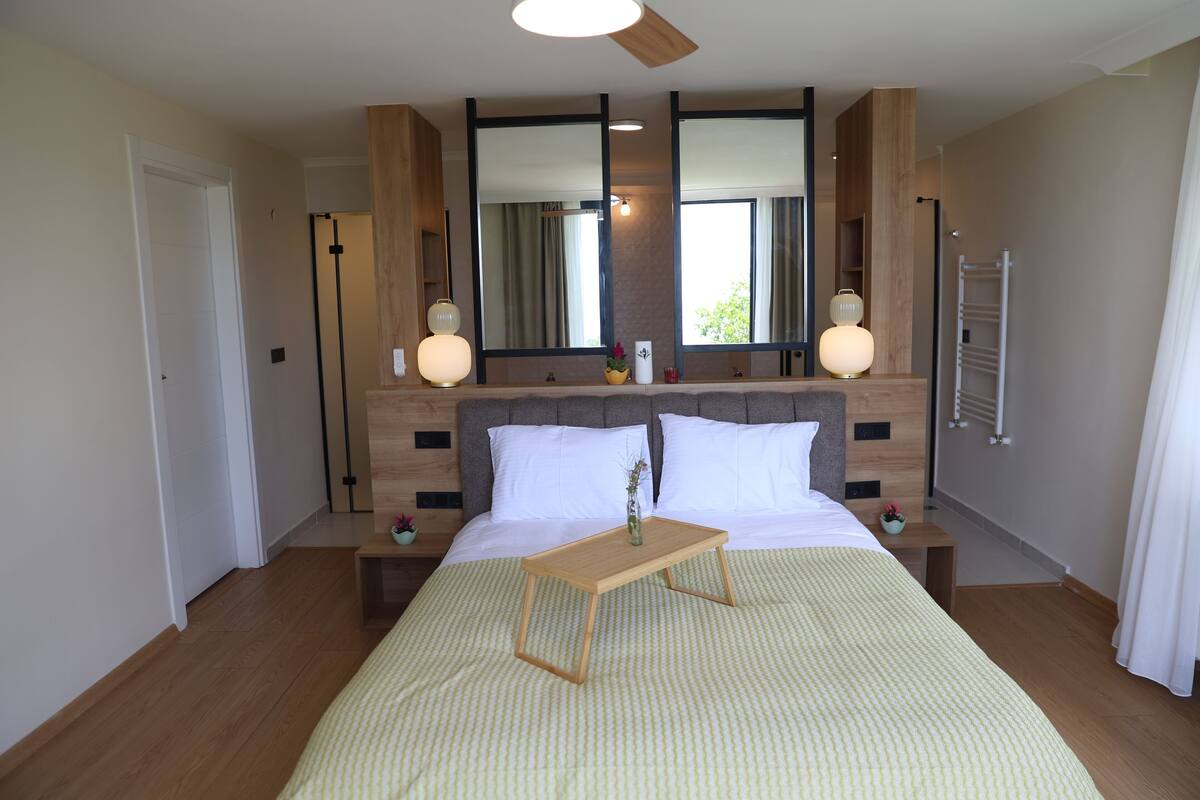 Apartamento Familiar | Secretária, quartos insonorizados, Wi-fi grátis