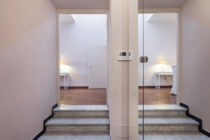 Apartamento, vista para a cidade | Área de estar