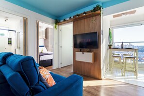 Apartamento | Área de estar | Smart TV 43 polegadas com canais digitais