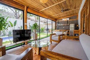 Casa conforto | Área de estar | TV de tela plana