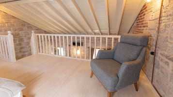 Suite Deluxe, vista para o jardim | 1 quarto, roupa de cama fornecida