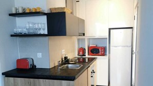 Casa | Cozinha privada | Um frigorífico, um micro-ondas, um forno, uma placa de cozinha 