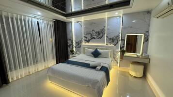 Quarto luxo | Frigobar, escrivaninha, Wi-Fi de cortesia, roupa de cama