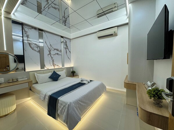 Quarto standard | Frigobar, escrivaninha, Wi-Fi de cortesia, roupa de cama