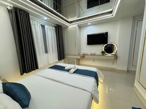 Quarto superior | Frigobar, escrivaninha, Wi-Fi de cortesia, roupa de cama