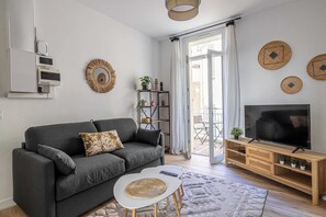 Apartamento conforto, sacada | Área de estar