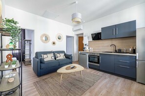 Apartamento família | Área de estar