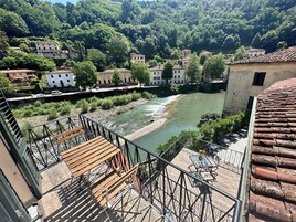 Quarto luxo, sacada, vista para o rio | Terraço/pátio