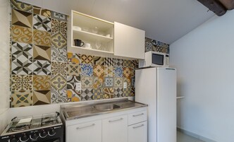 Apartamento Básico | Cozinha privada | Utensílios de cozinha 