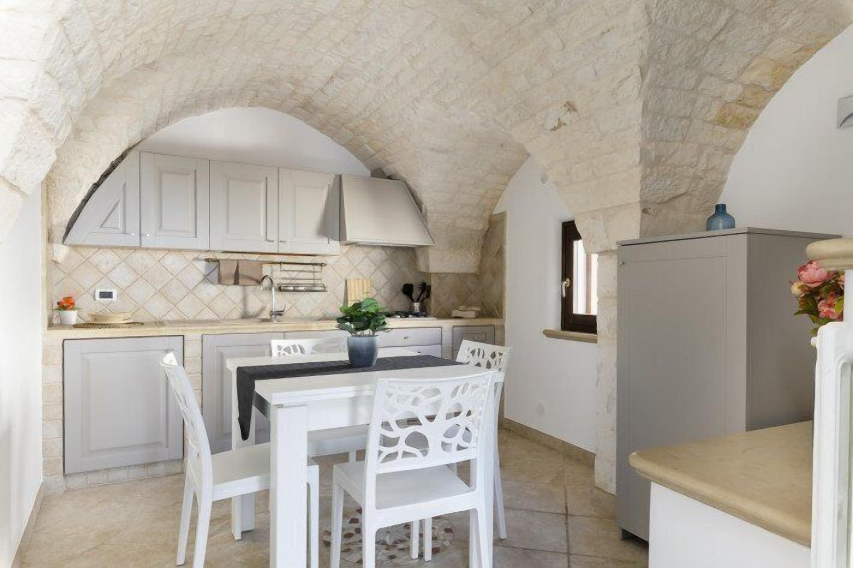 Apartamento, Vista para a cidade | Cozinha privada | Uma cadeira de bebé 