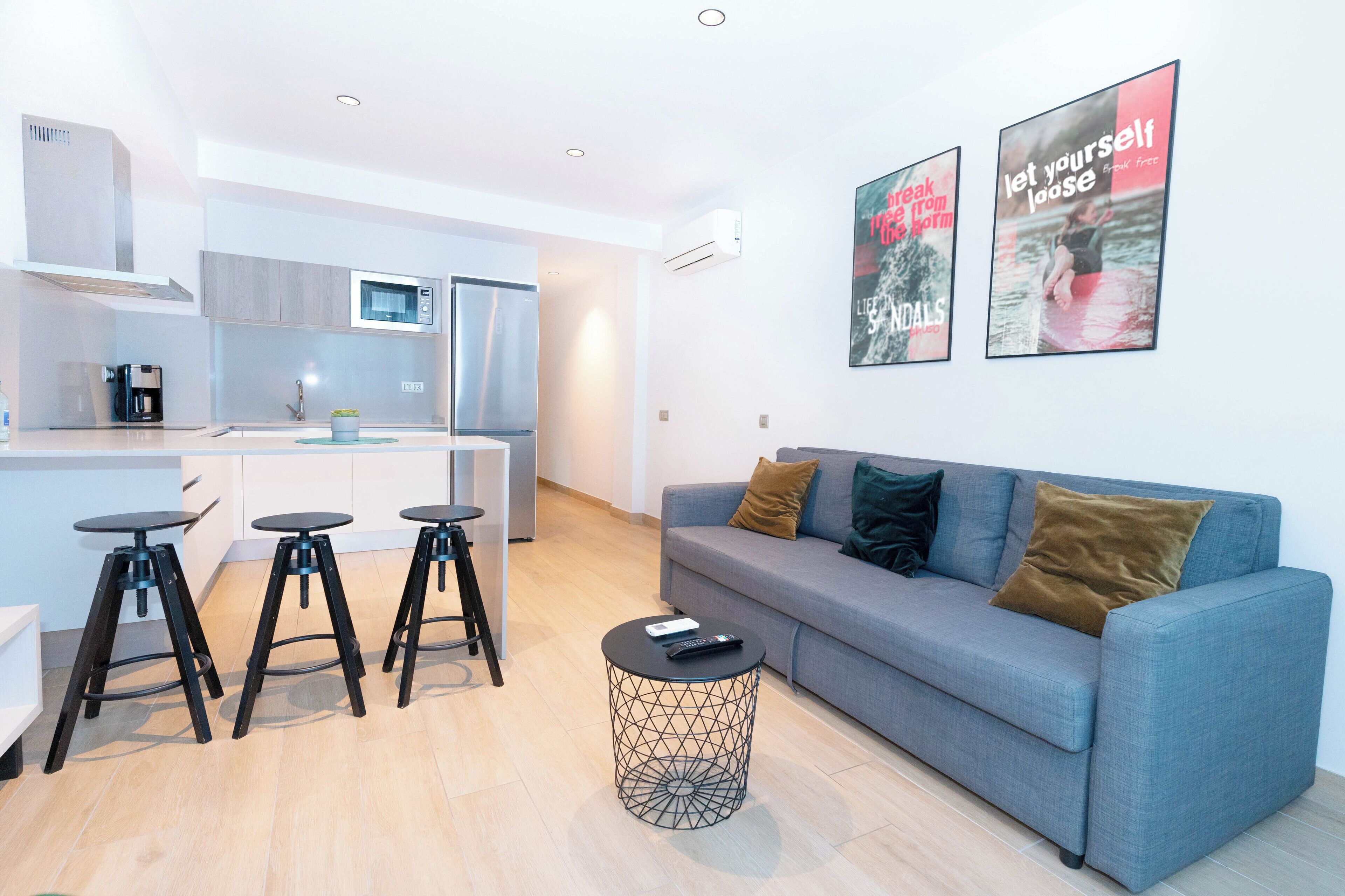 Apartamento Superior | Sala de estar | TV de ecrã plano 