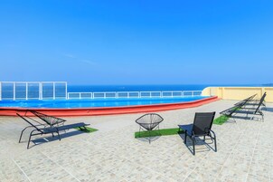 Piscina exterior, da(s) 9:00 à(s) 20:00, espreguiçadeiras