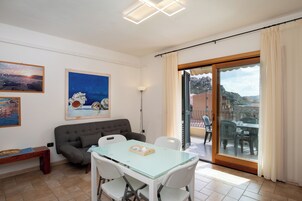 Apartamento | Área de estar | TV