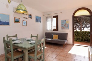 Apartamento | Área de estar | TV