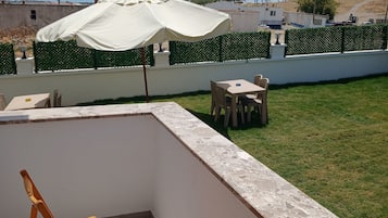Quarto Duplo Comfort, varanda, vista para o jardim | Terraço/pátio interior