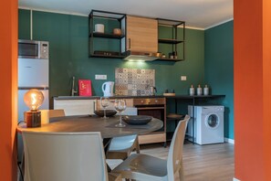 Apartamento | Sala de estar | Televisor de 35 polegadas com canais digitais 